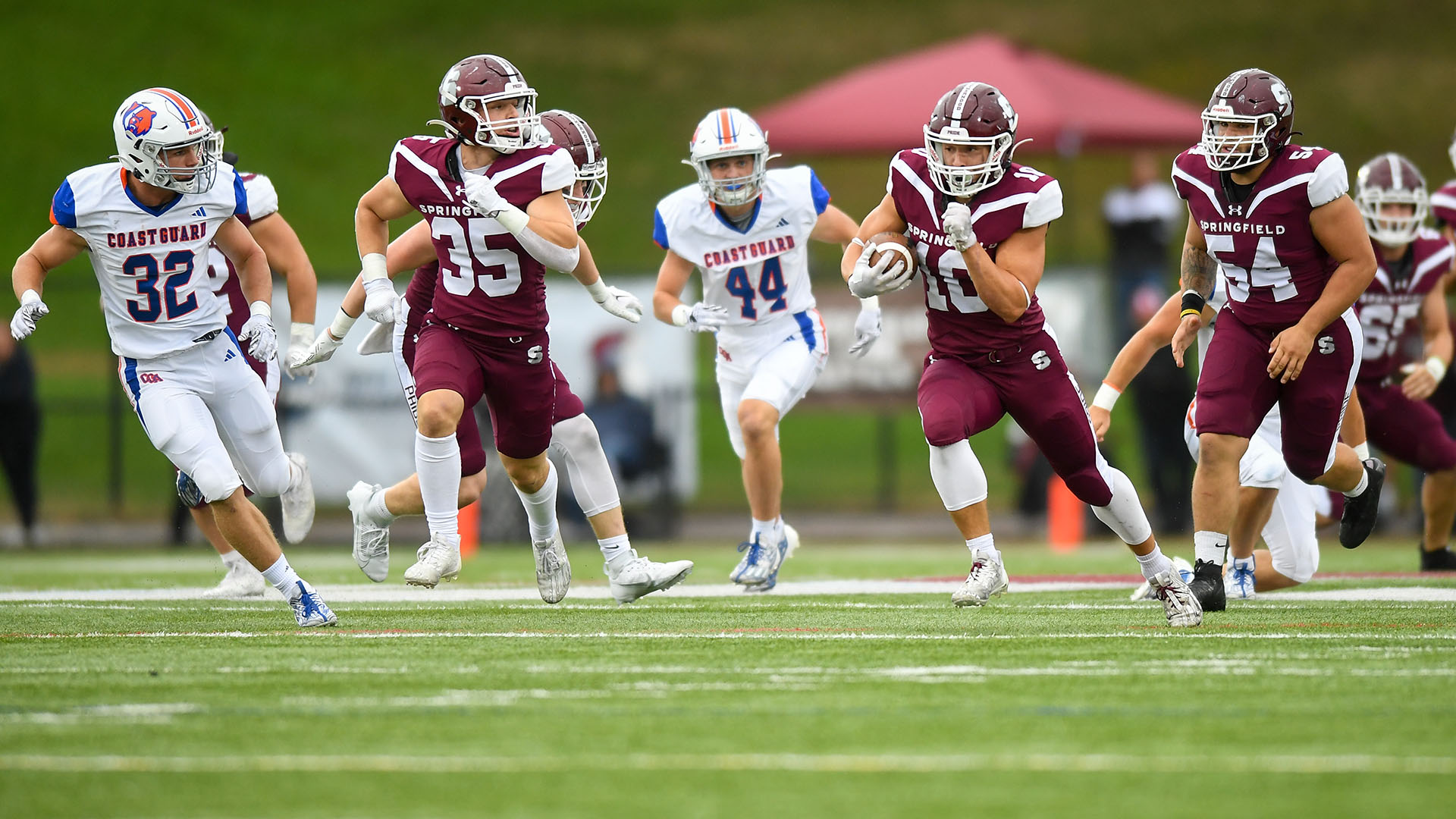 Football Rolls Past Coast Guard, 63-14, Behind Program Record 686 ...