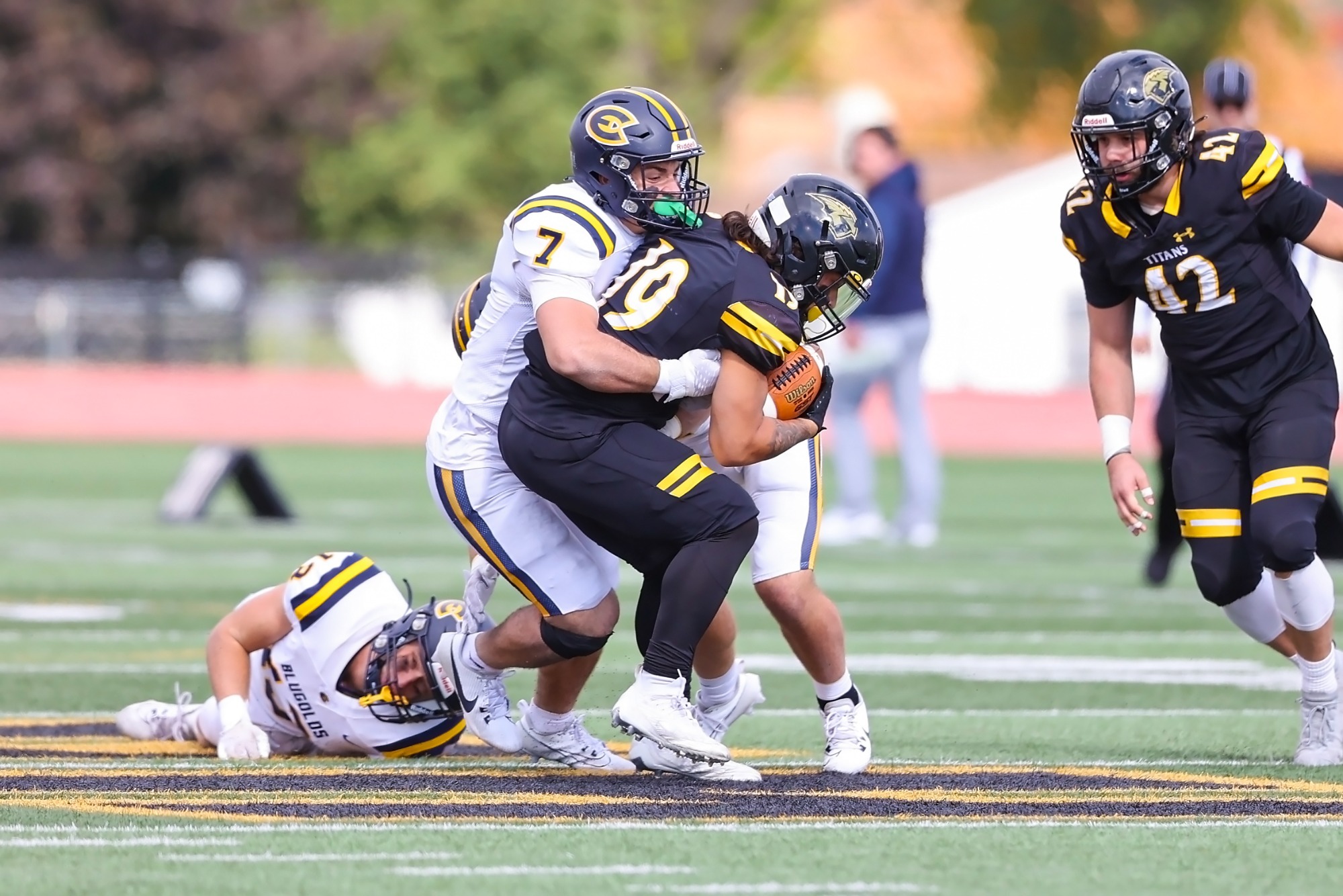 Football's fast start overwhelmed by Titans - University of Wisconsin ...